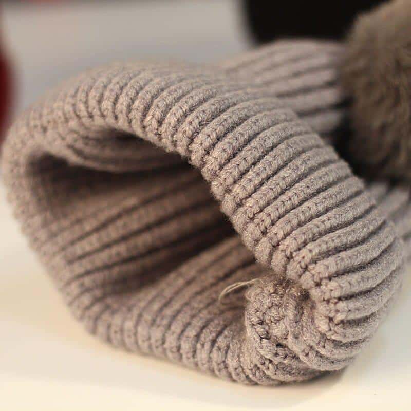 Gebreide muts met dubbele pompon • Kinder World